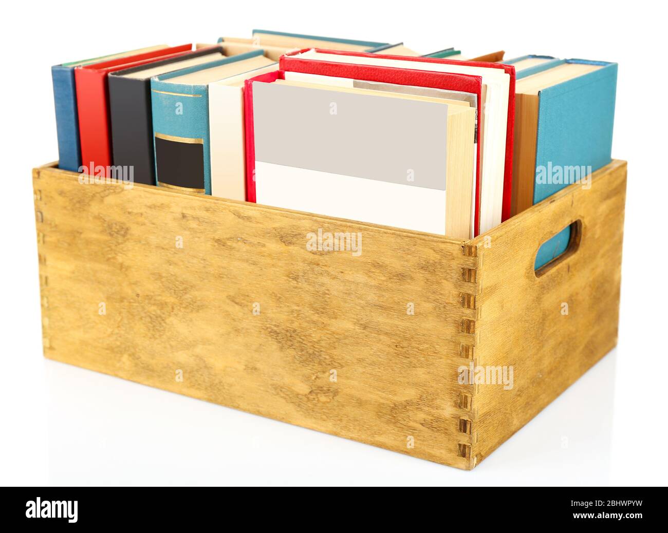 Books in wooden box, closeup Stock Photo - Alamy