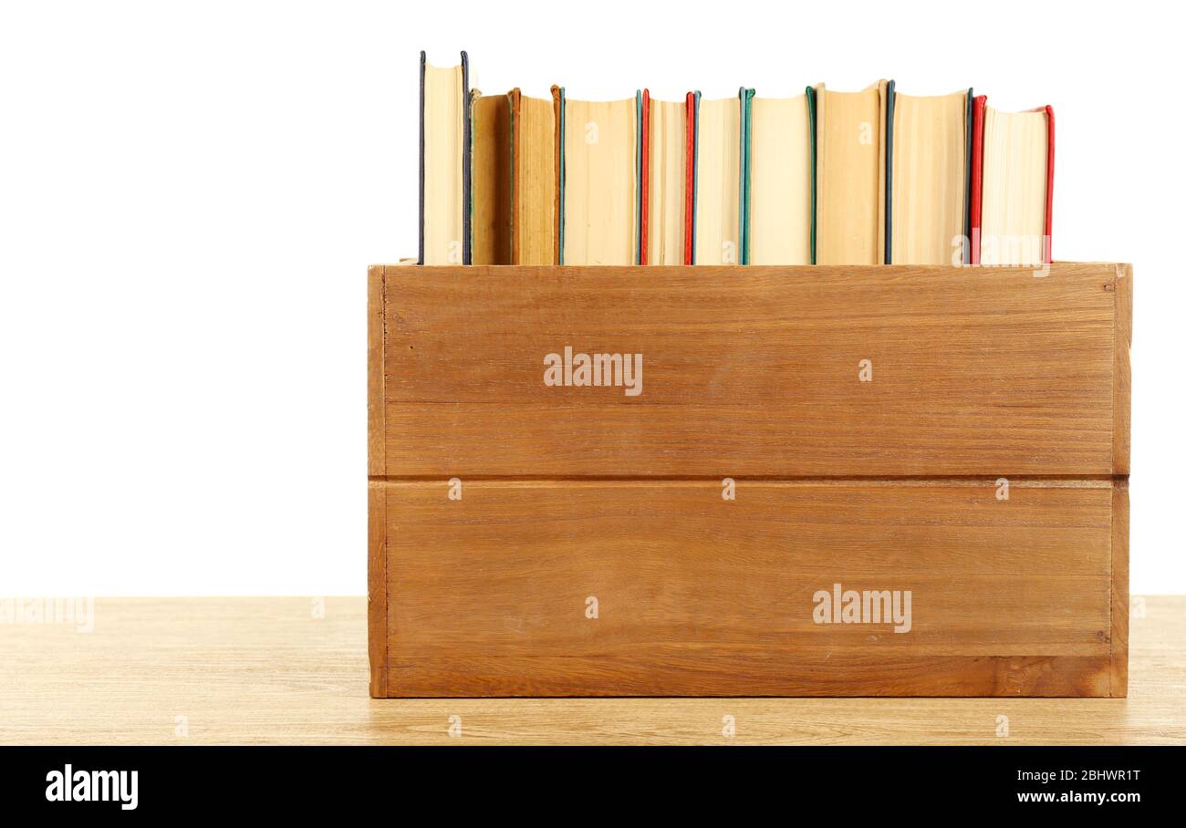 Books in wooden box isolated on white Stock Photo - Alamy