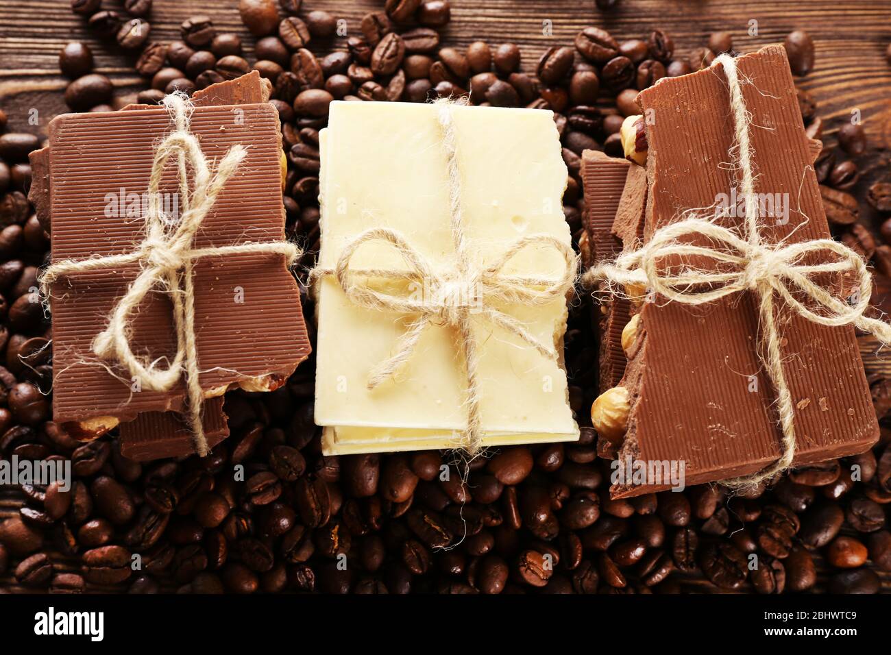 Stack of tied chocolate with coffee beans, top view Stock Photo - Alamy