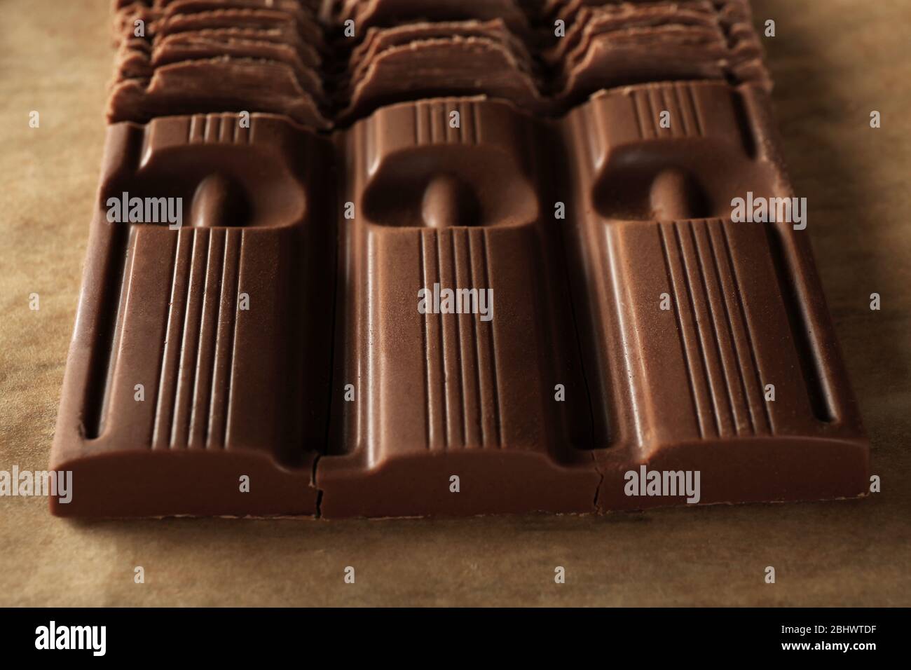 Chopped chocolate on parchment, closeup Stock Photo - Alamy