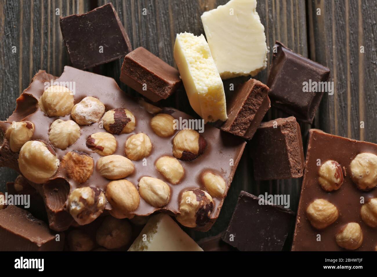 Set of chocolate with hazelnut, closeup Stock Photo - Alamy