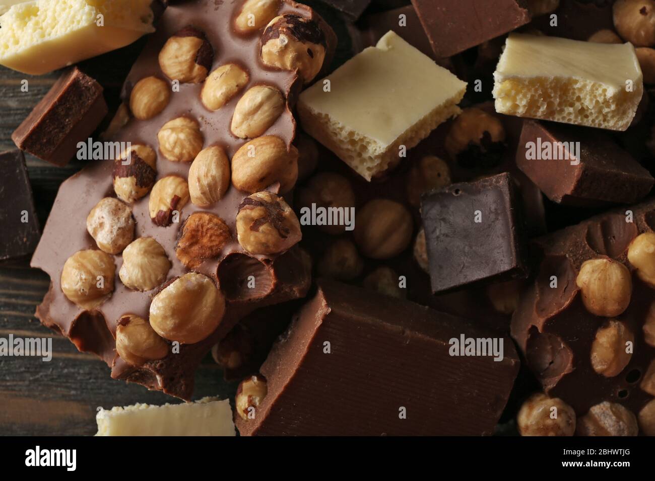 Set of chocolate with hazelnut, closeup Stock Photo - Alamy