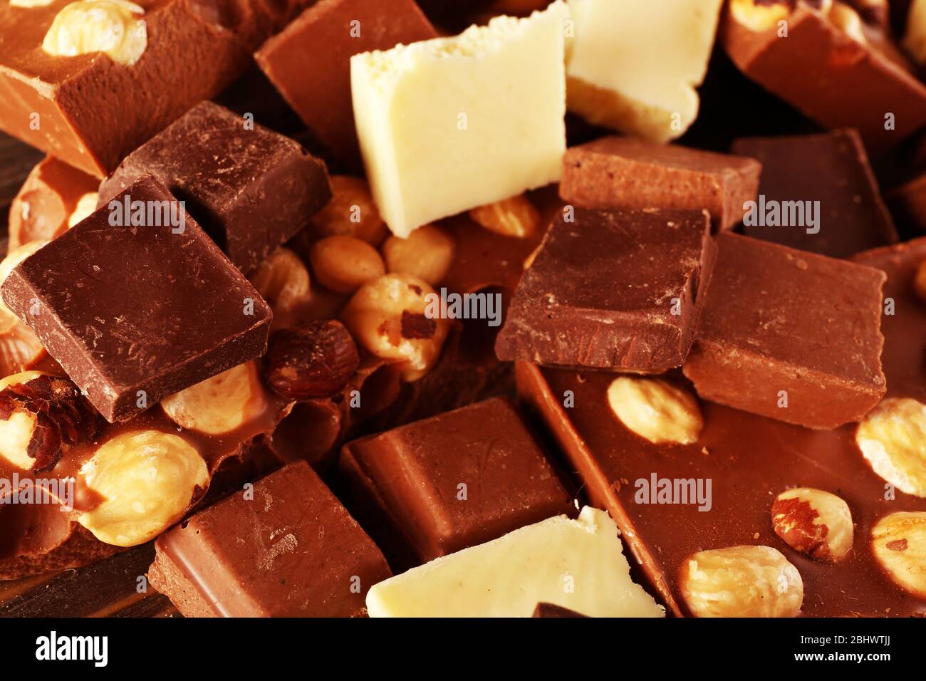 Set of chocolate with hazelnut, closeup Stock Photo - Alamy
