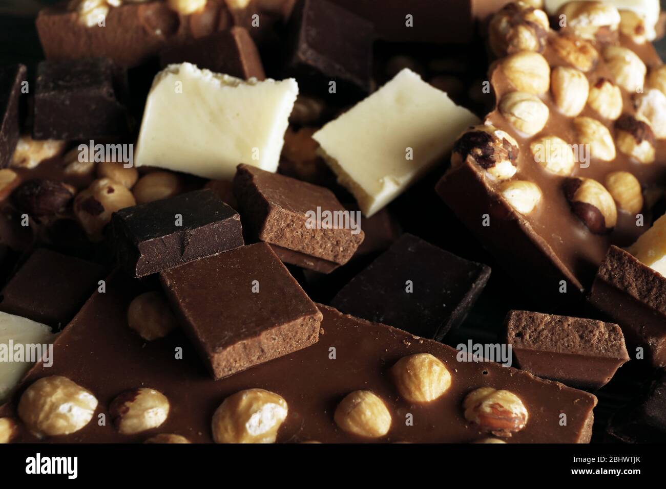 Set of chocolate with hazelnut, closeup Stock Photo - Alamy