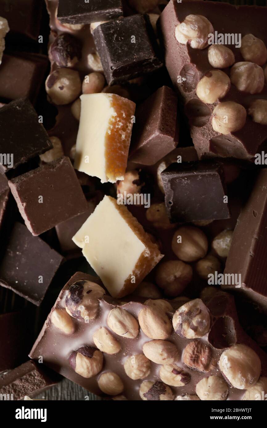 Set of chocolate with hazelnut, closeup Stock Photo - Alamy