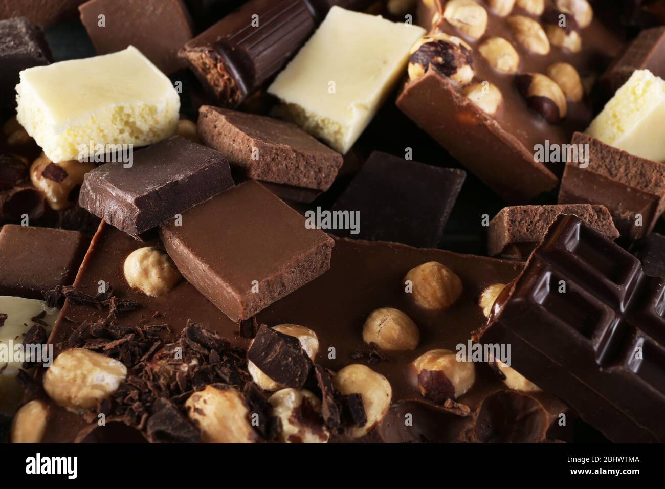 Set of chocolate with hazelnut, closeup Stock Photo - Alamy