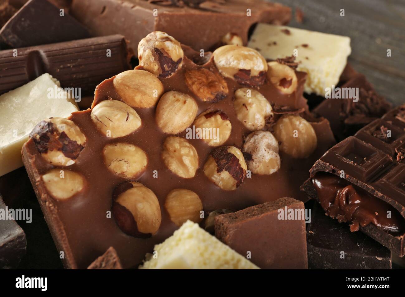 Set of chocolate with hazelnut, closeup Stock Photo - Alamy