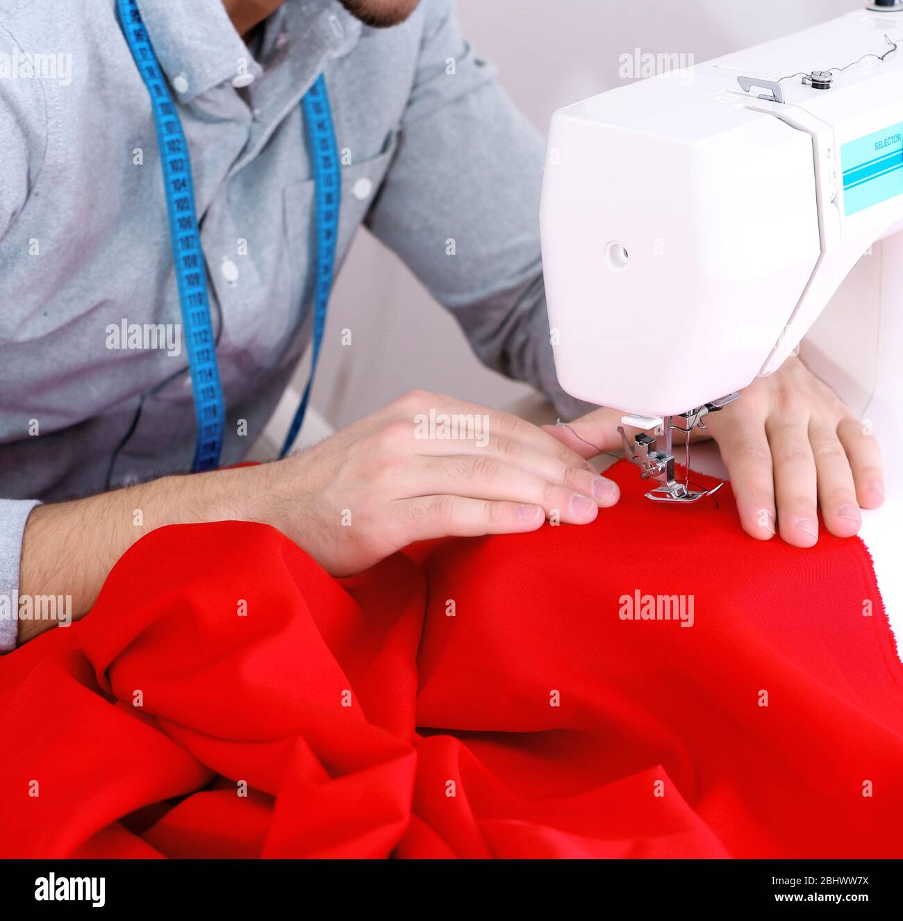 Sewing machine busy sewing clothes hi-res stock photography and images ...