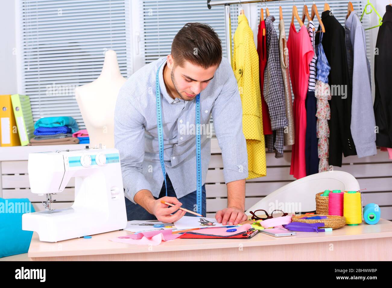 Male fashion designer sketching hi-res stock photography and images - Alamy