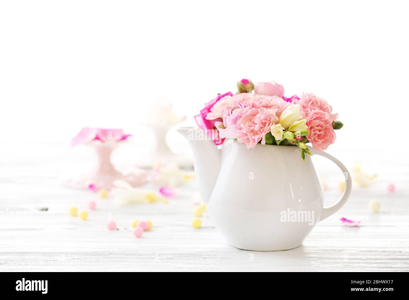 Beautiful spring flowers in teapot Stock Photo - Alamy