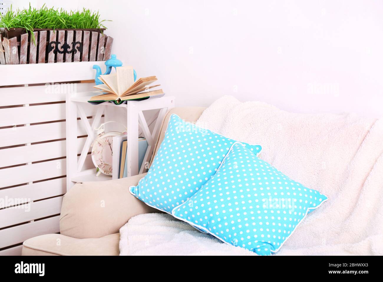 Modern room with comfortable sofa, indoors Stock Photo - Alamy