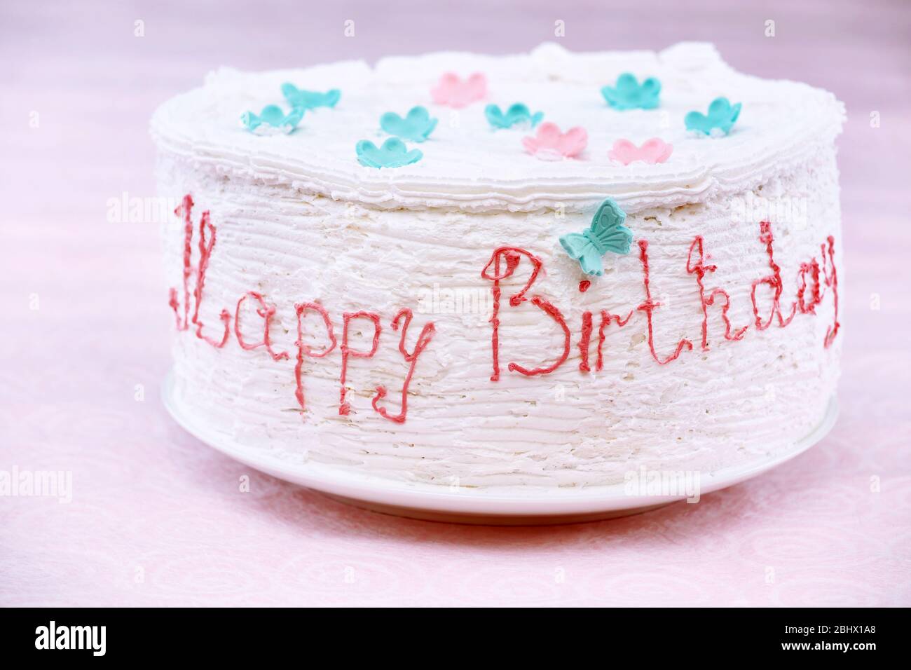 Birthday cake on light background Stock Photo - Alamy