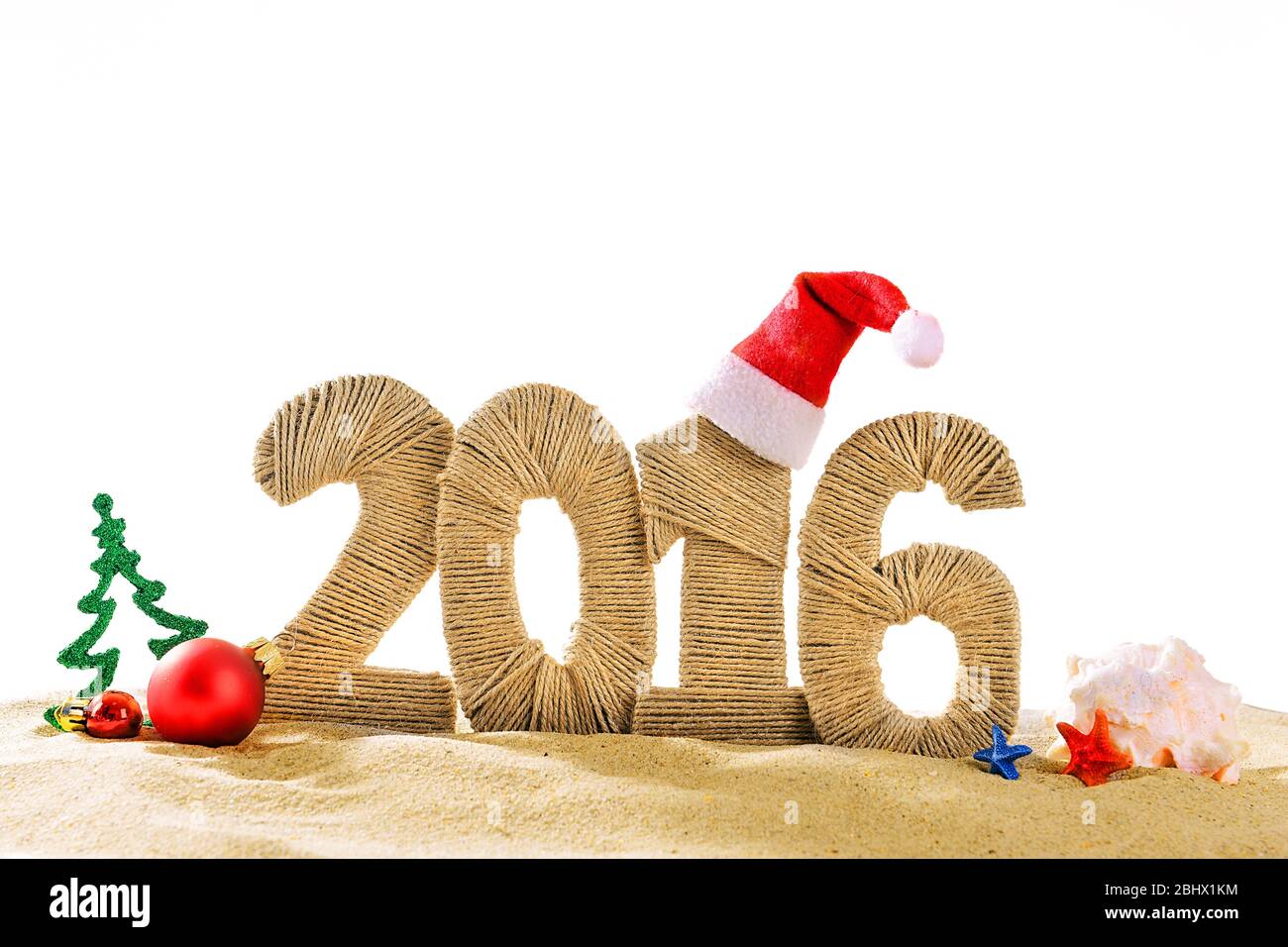 New year 2016 sign on beach sand Stock Photo - Alamy