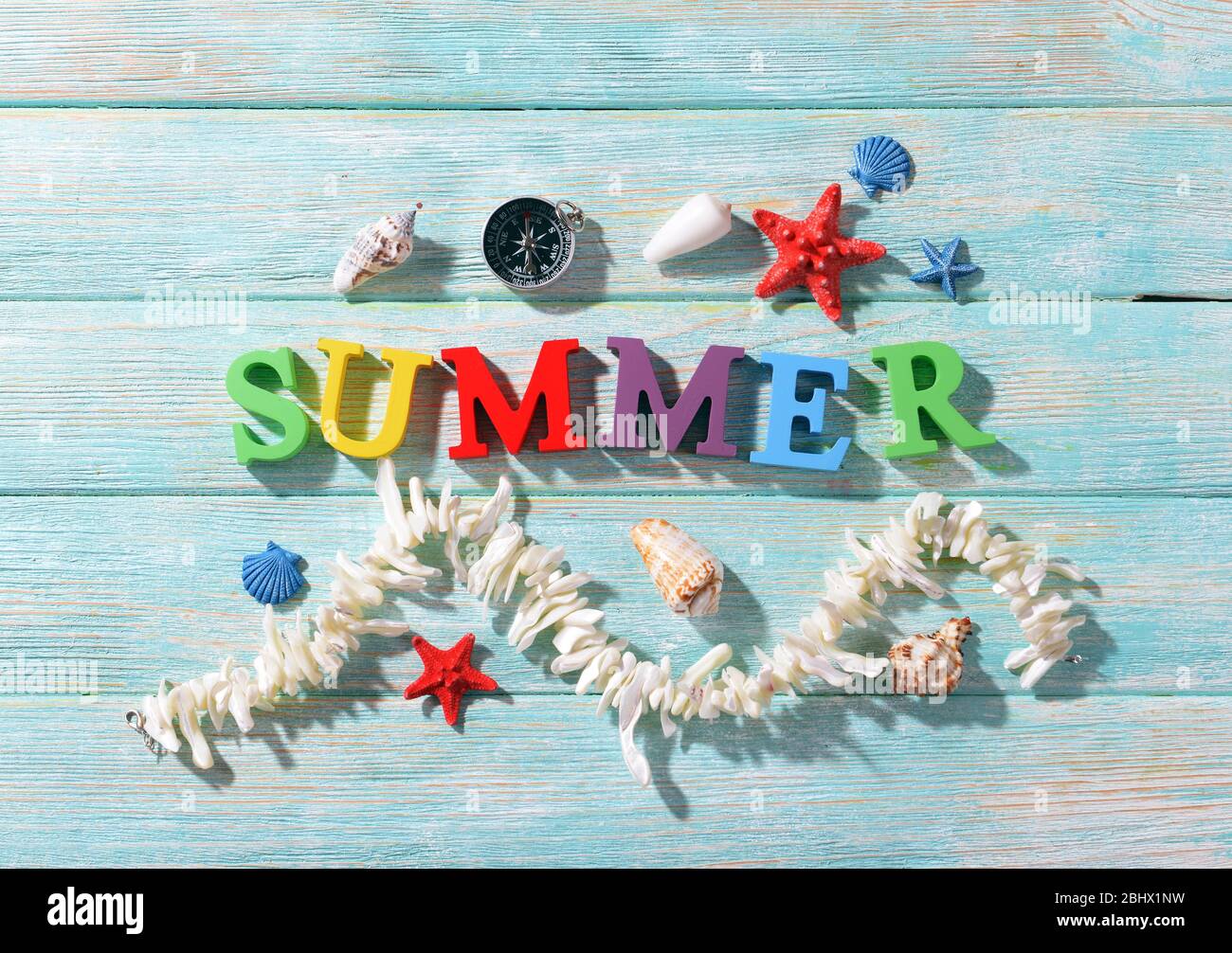 Word summer on wooden background Stock Photo - Alamy