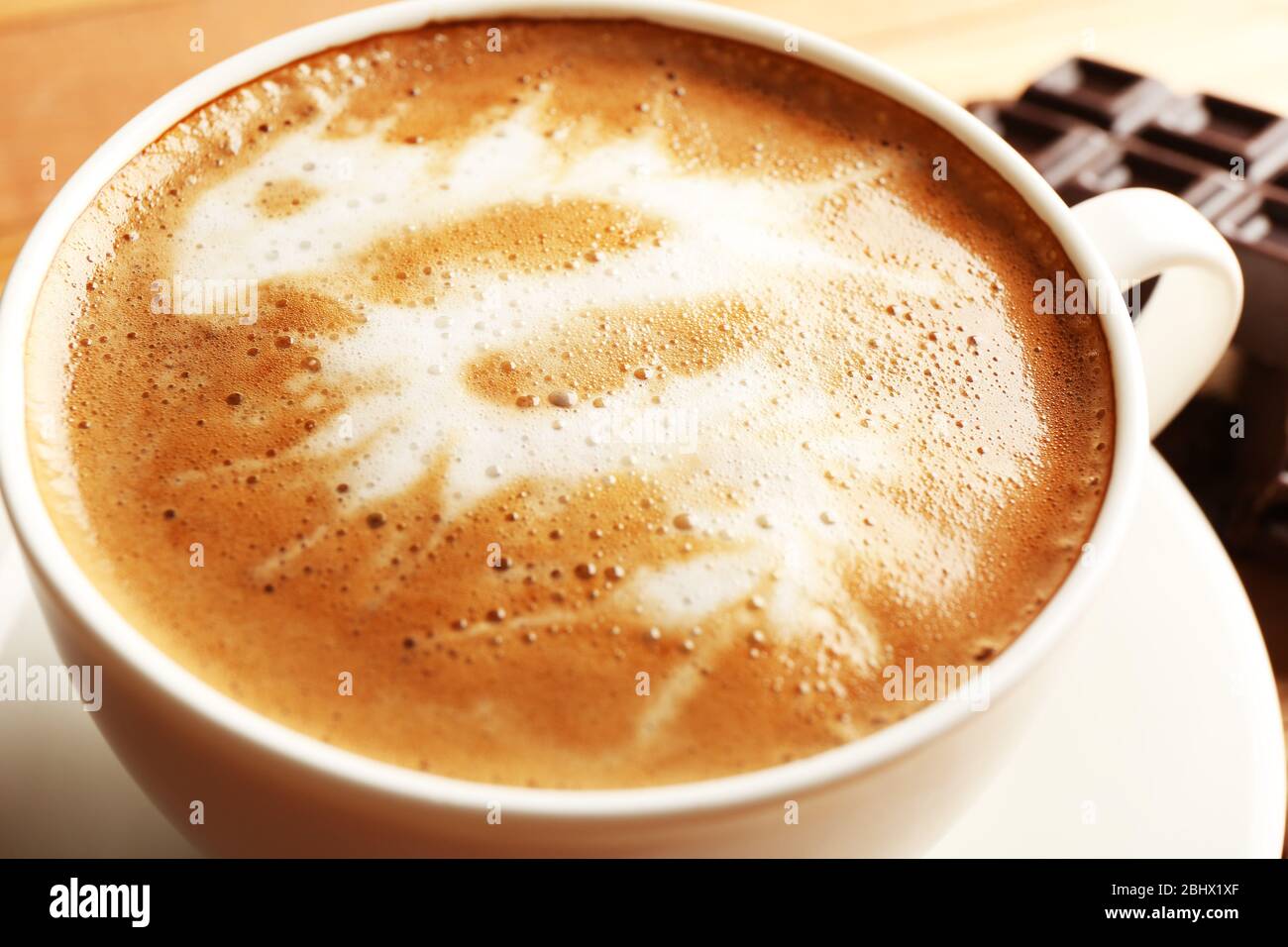 Cup of coffee latte art, closeup Stock Photo - Alamy