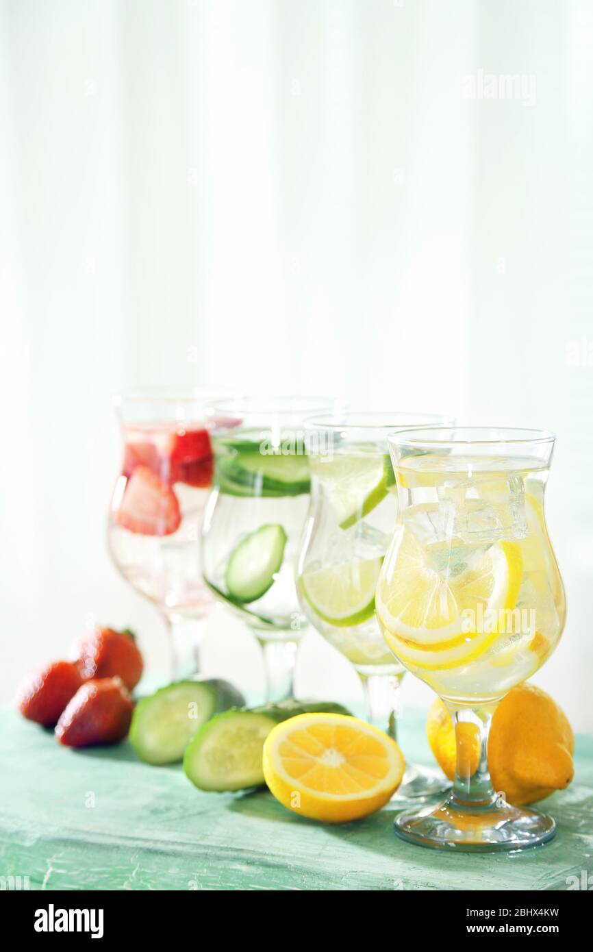 Glasses of different home made freshness healthy vitamin-fortified ...