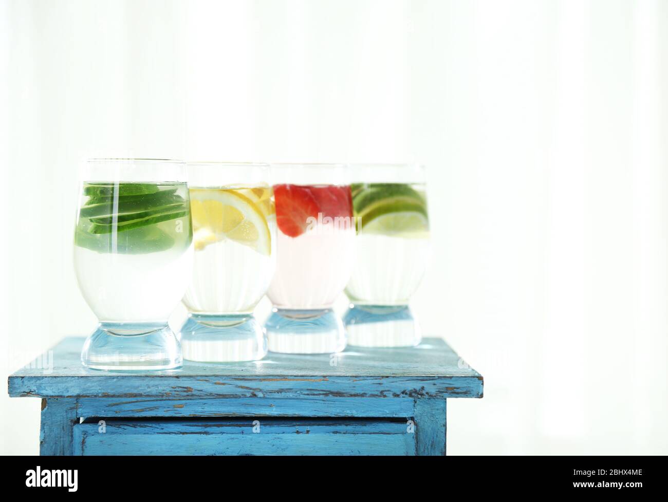 Glasses of different home made freshness healthy vitamin-fortified ...