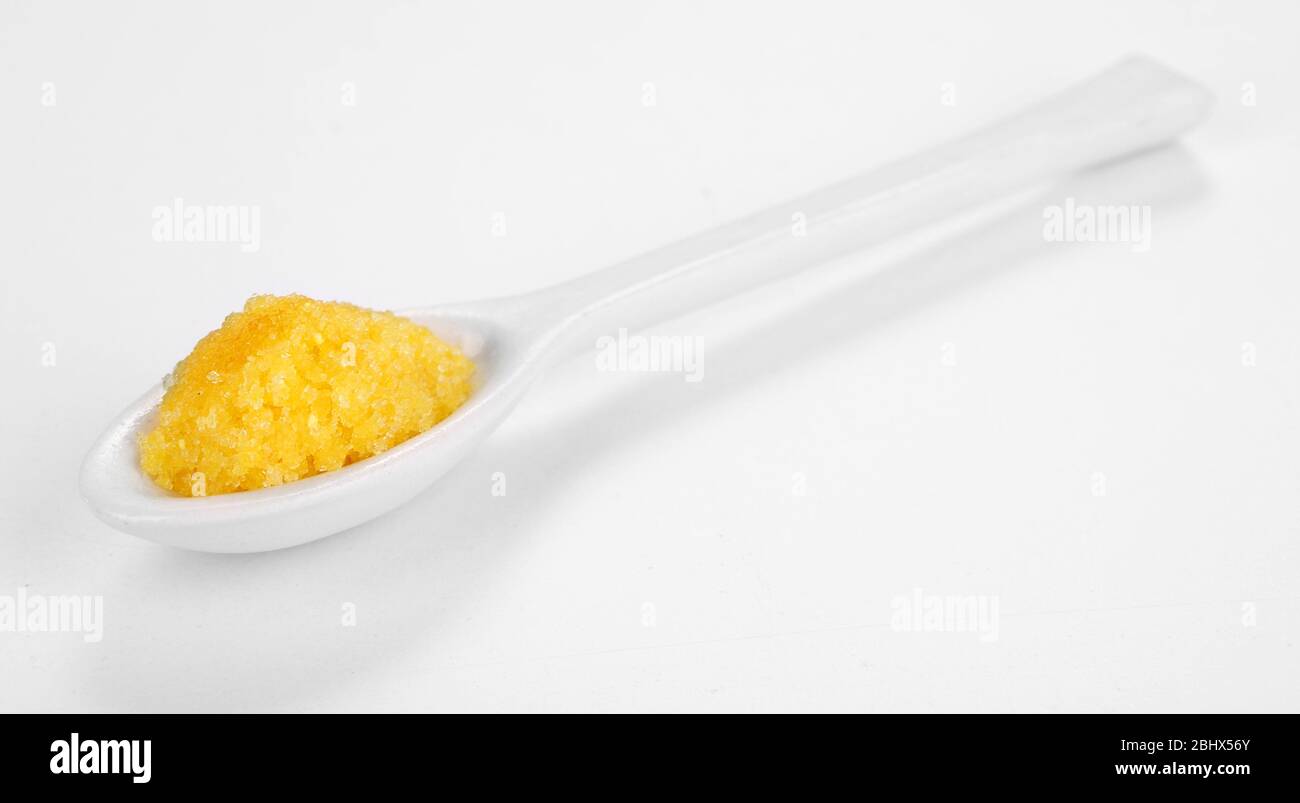 Laboratory spatula with granules isolated on white Stock Photo - Alamy