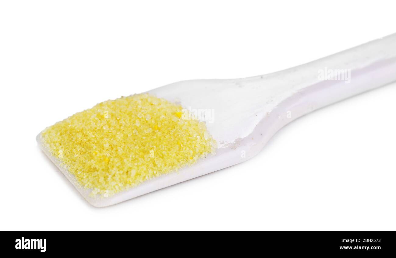 Laboratory spatula with granules isolated on white Stock Photo - Alamy
