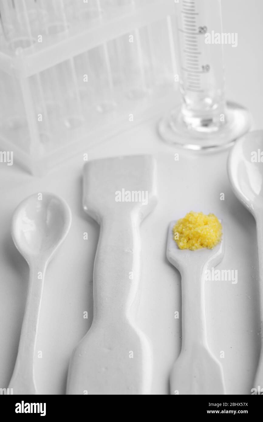Laboratory spatulas on white table Stock Photo - Alamy