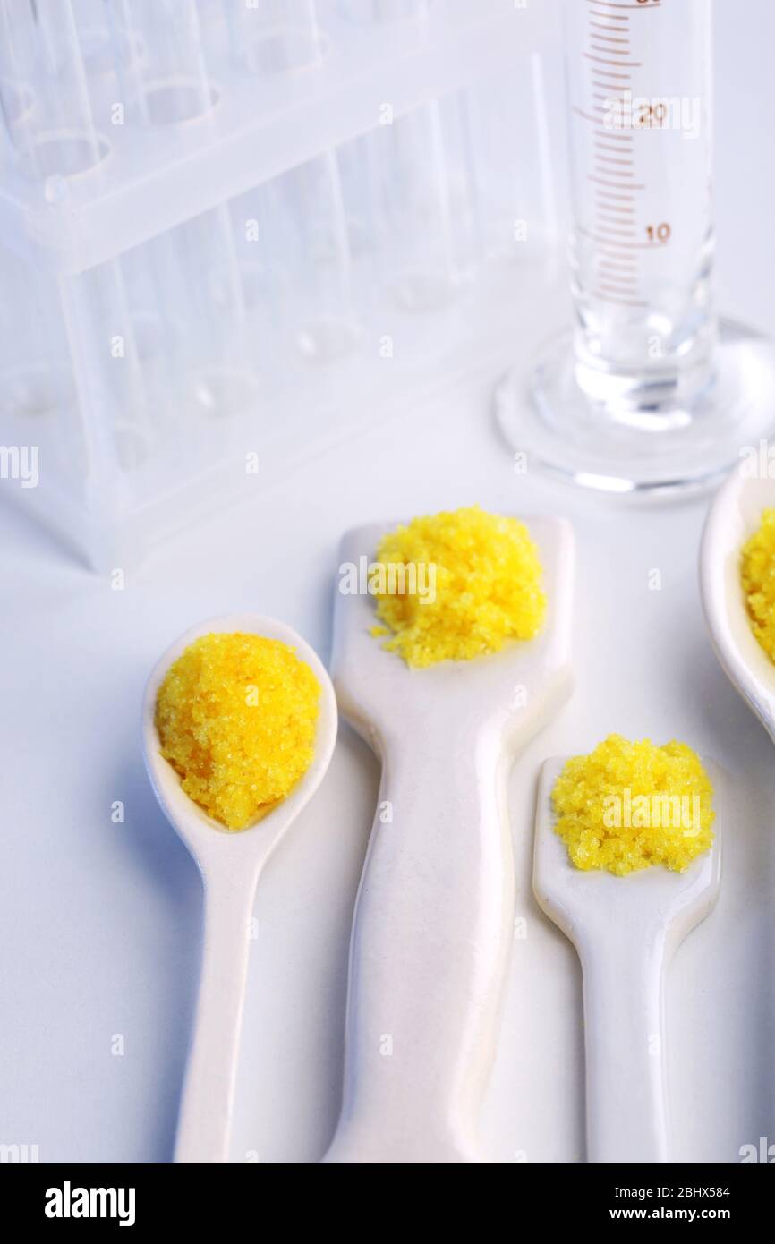 Laboratory spatulas on white table Stock Photo - Alamy