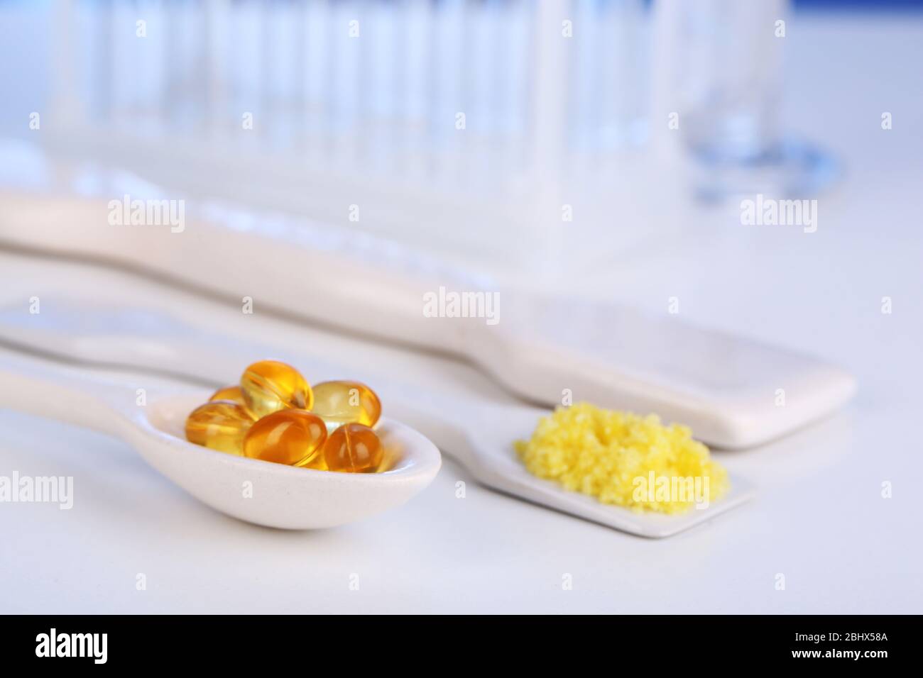 Laboratory spatulas on white table Stock Photo - Alamy
