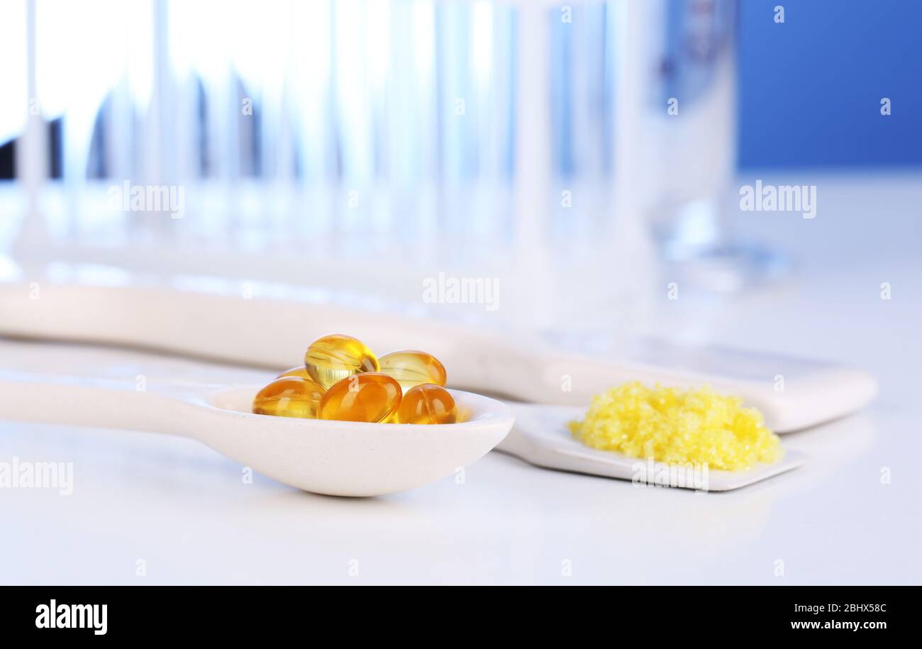 Laboratory spatulas on white table Stock Photo - Alamy