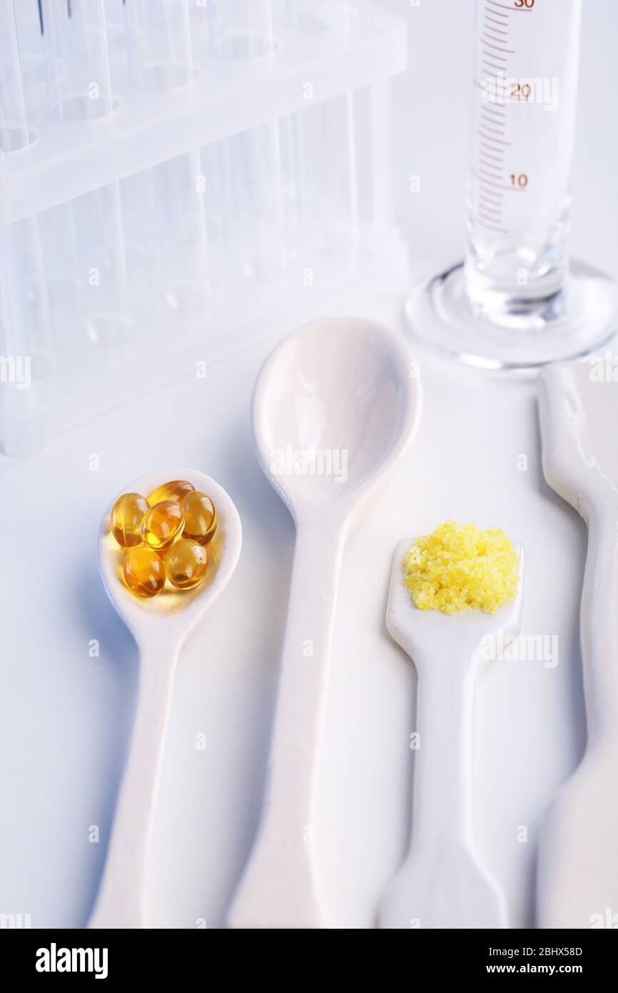 Laboratory spatulas on white table Stock Photo - Alamy