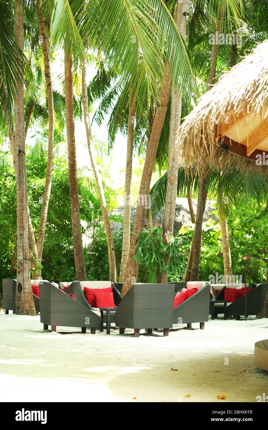 Restaurant platform with seats in resort Stock Photo - Alamy