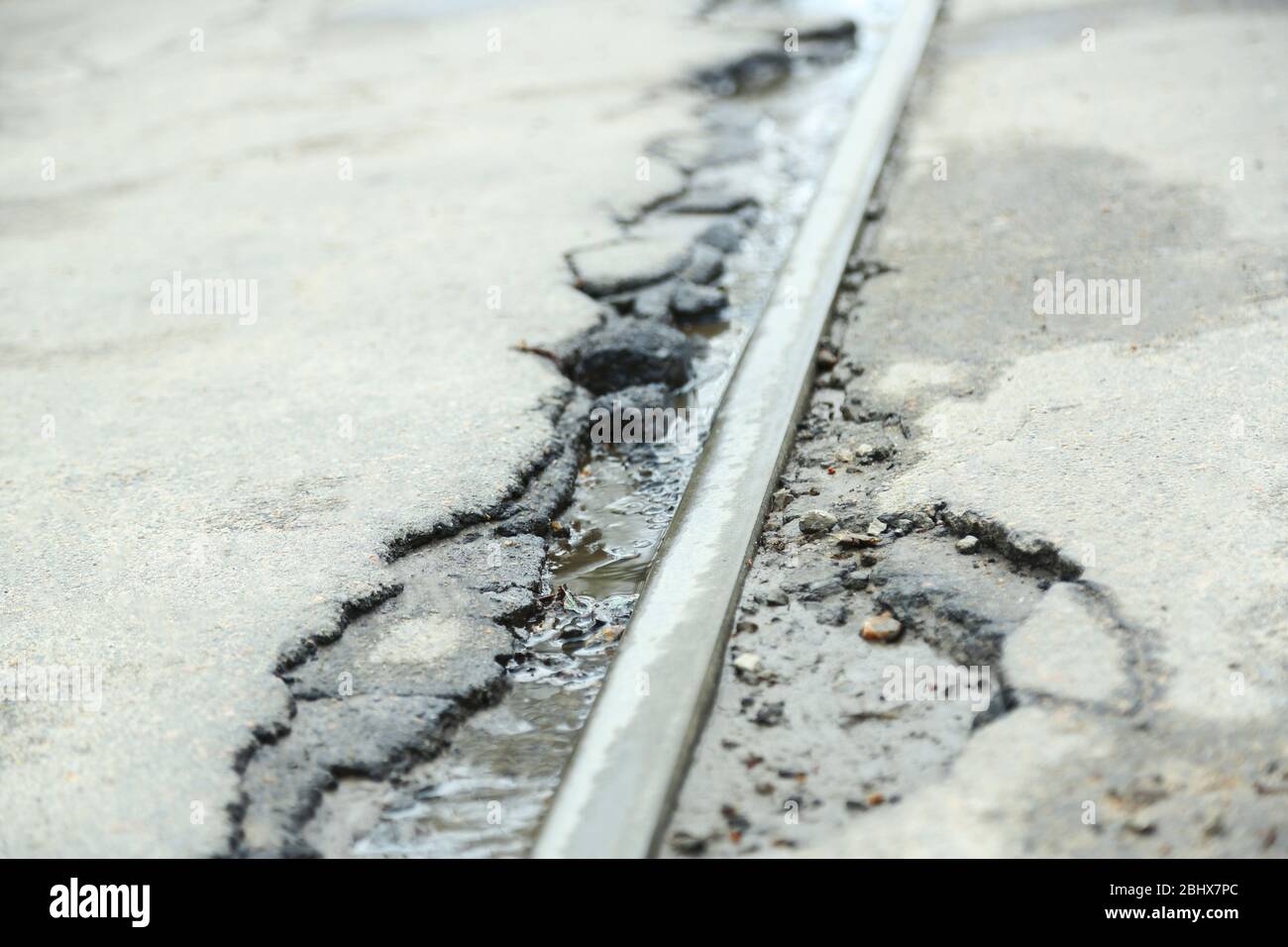 Broken asphalt close up Stock Photo - Alamy
