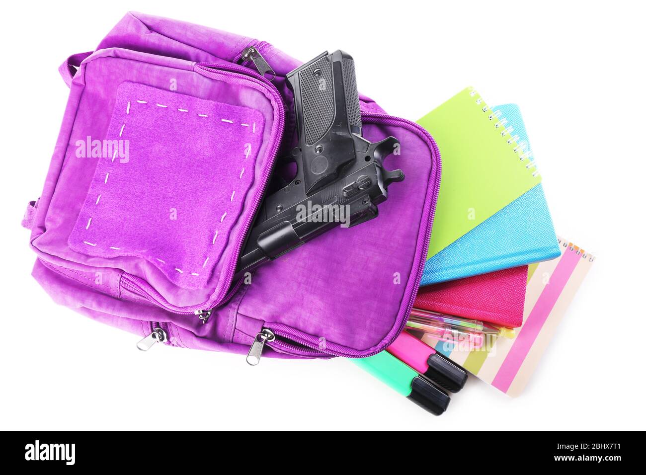 Gun in school backpack, isolated on white Stock Photo - Alamy
