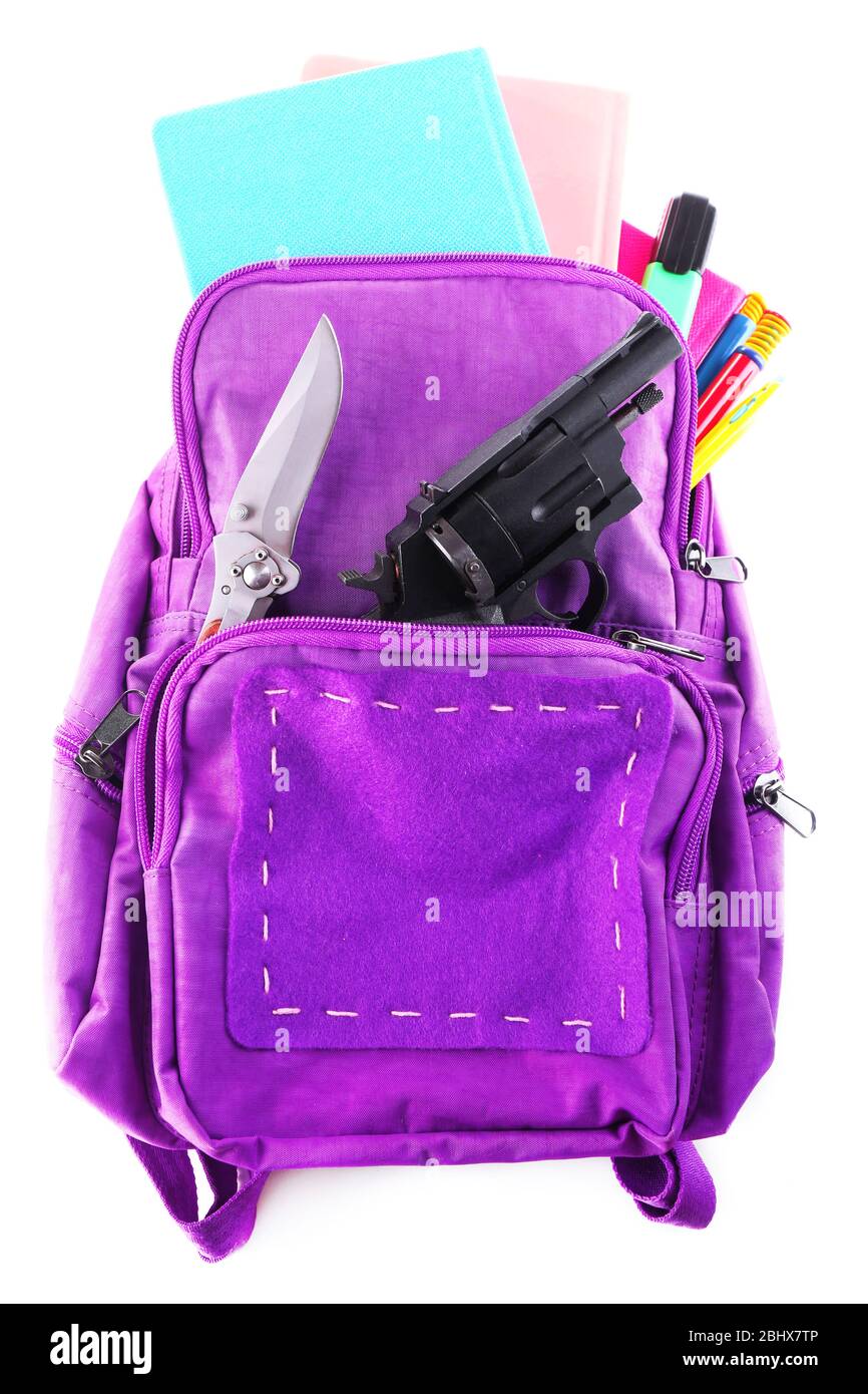 Gun in school backpack, isolated on white Stock Photo - Alamy