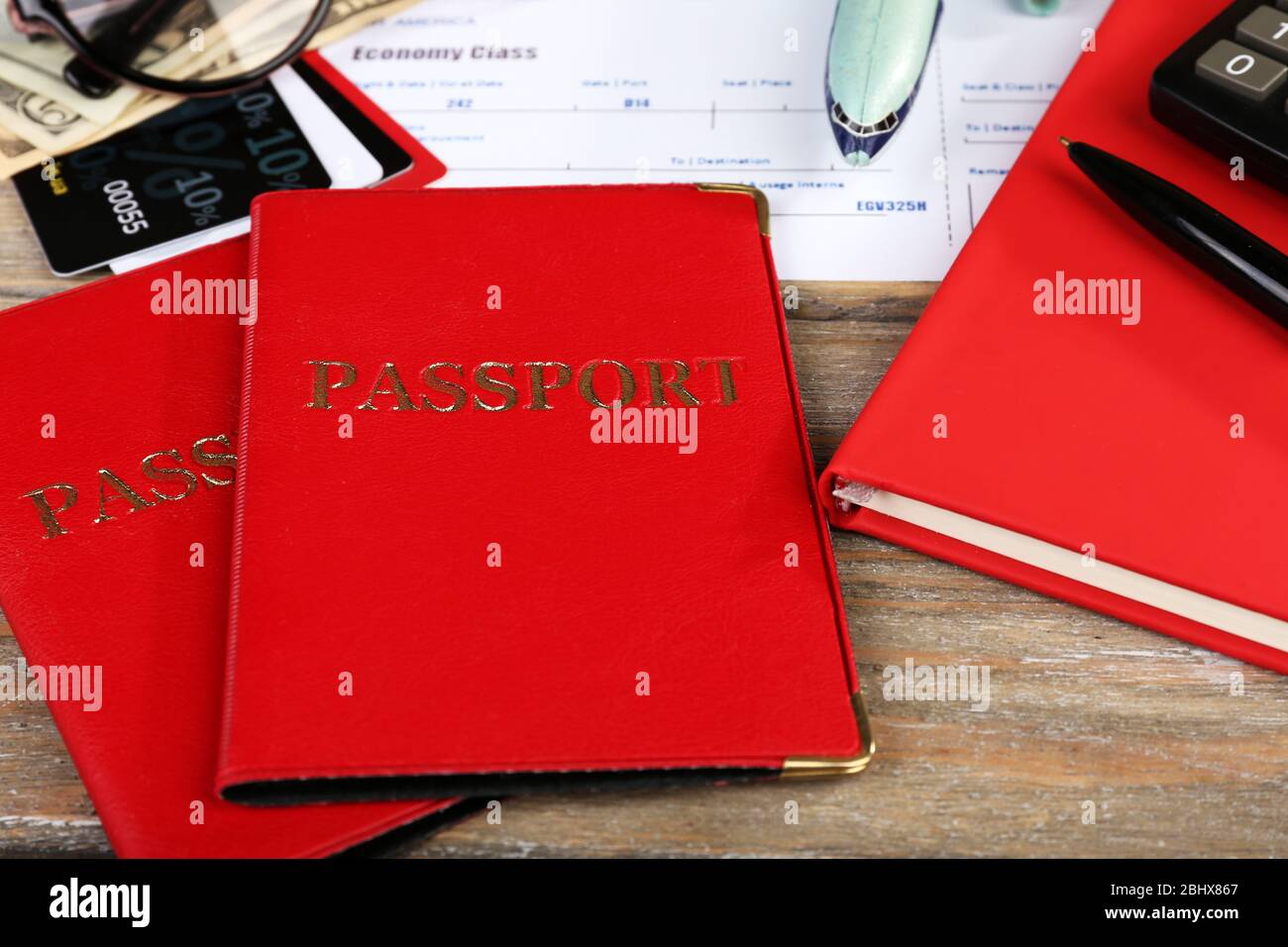 Closeup passports airplane model hi-res stock photography and images ...