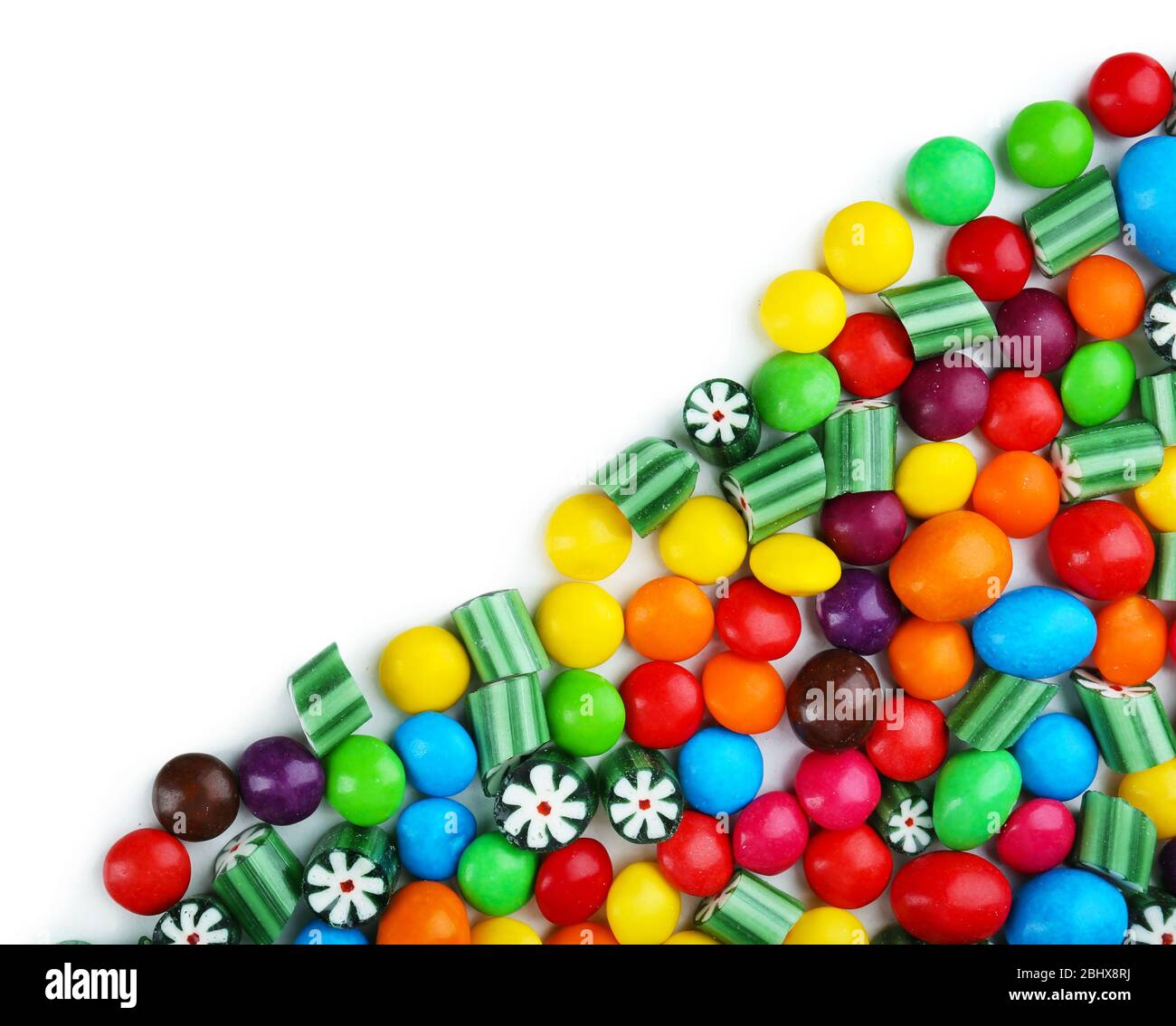 Colorful candies isolated on white Stock Photo - Alamy