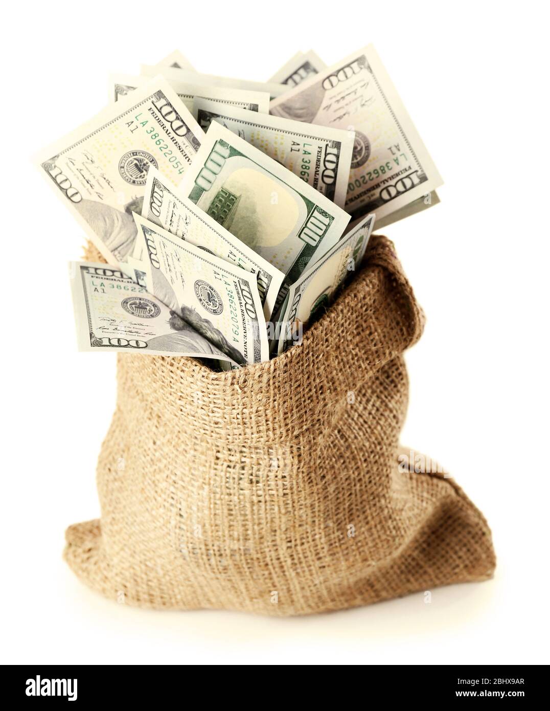 Money in bag isolated on white Stock Photo - Alamy