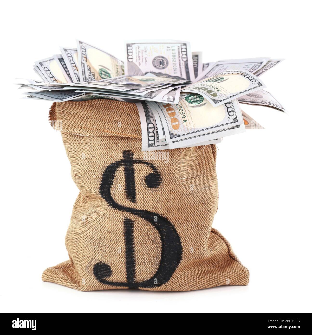 Money in bag isolated on white Stock Photo - Alamy