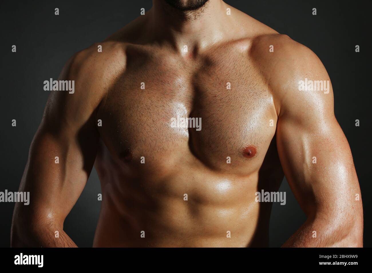 Muscle young man close up Stock Photo - Alamy
