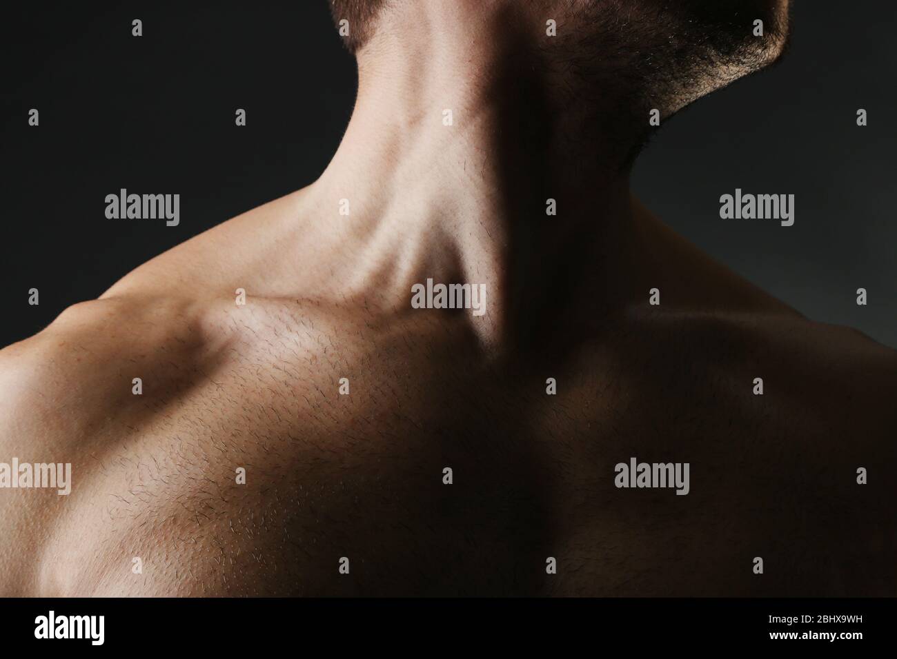 Muscle young man close up Stock Photo - Alamy