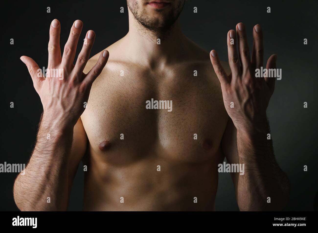 Muscle young man close up Stock Photo - Alamy