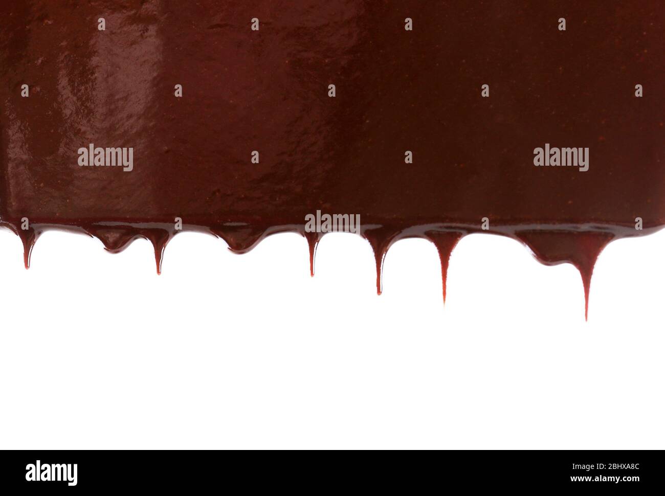 Chocolate stream isolated on white Stock Photo - Alamy