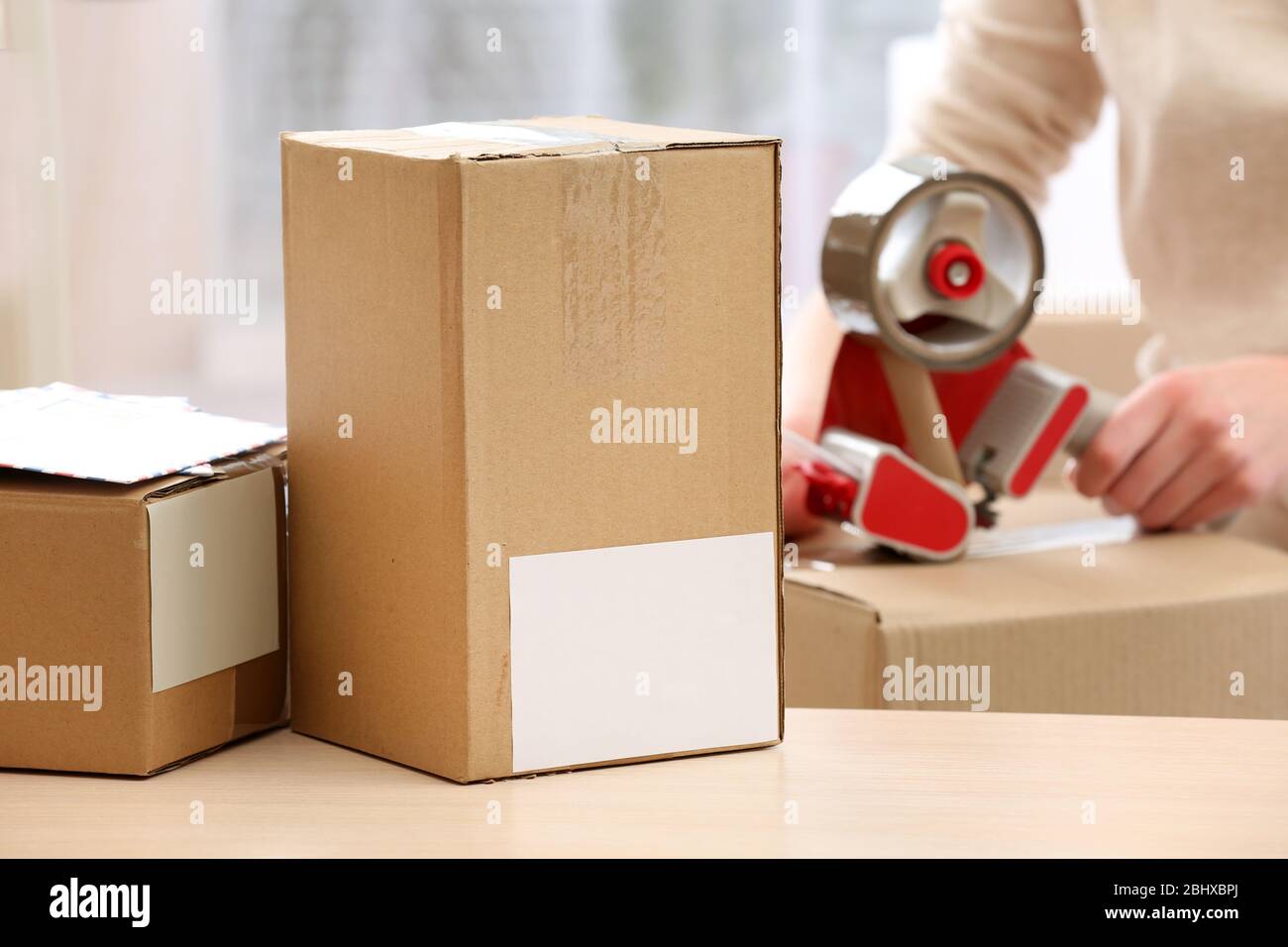 Delivering post packs hi-res stock photography and images - Alamy