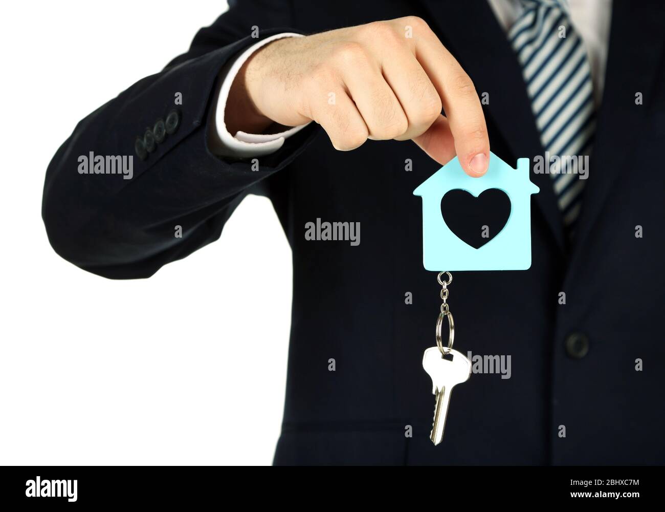 Hand with keys isolated on white Stock Photo - Alamy