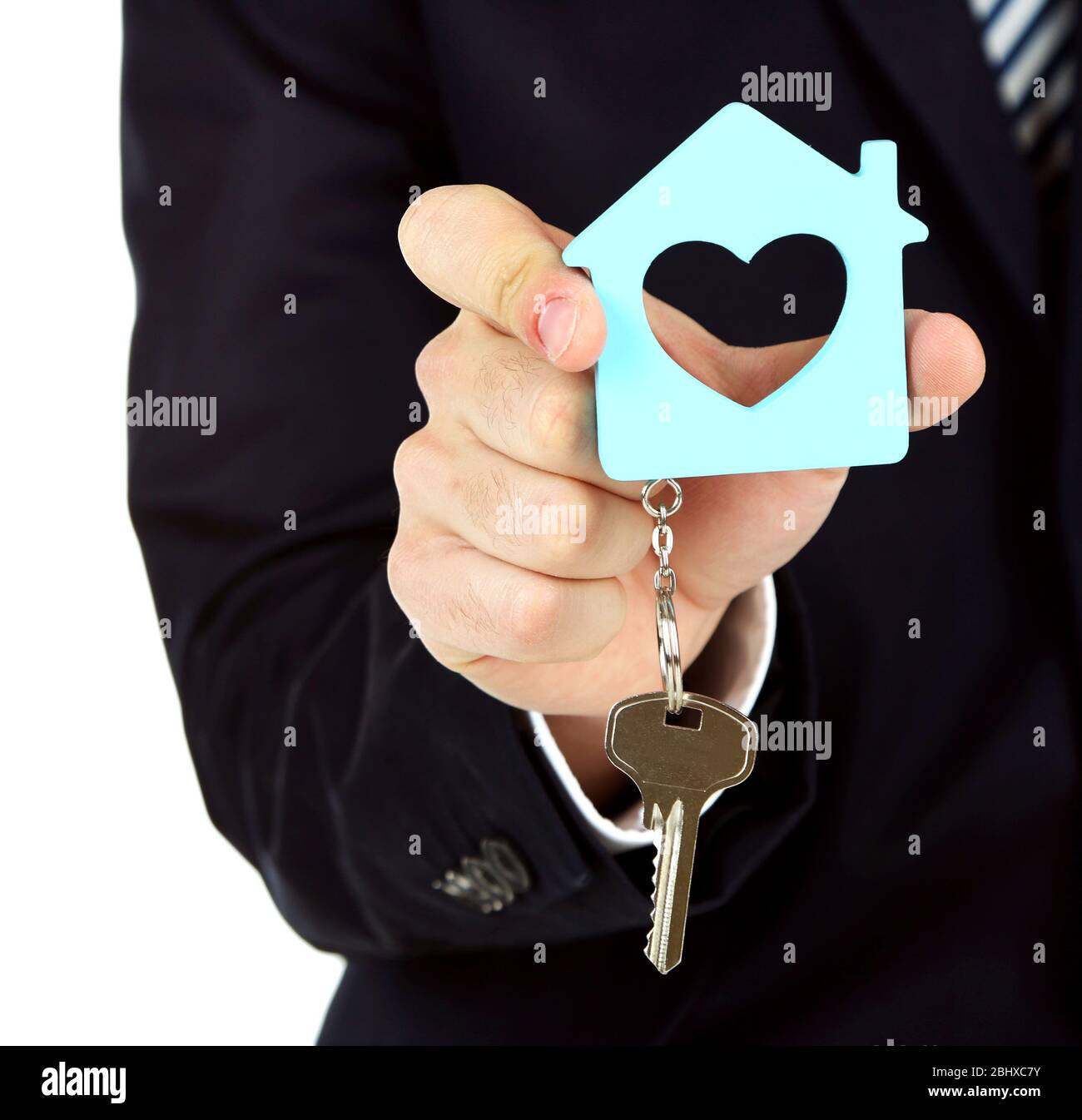 Hand with keys isolated on white Stock Photo - Alamy