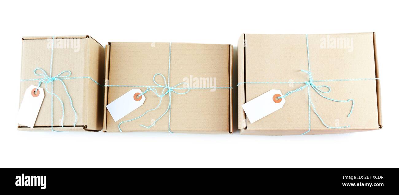 Mail package parcels isolated on white Stock Photo - Alamy