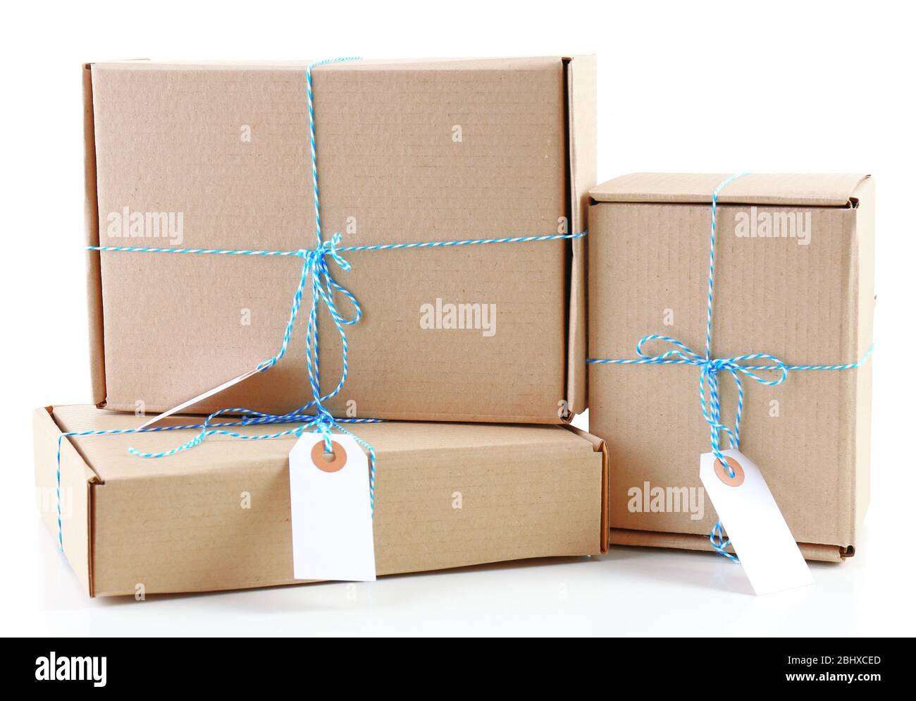 Mail package parcels isolated on white Stock Photo - Alamy