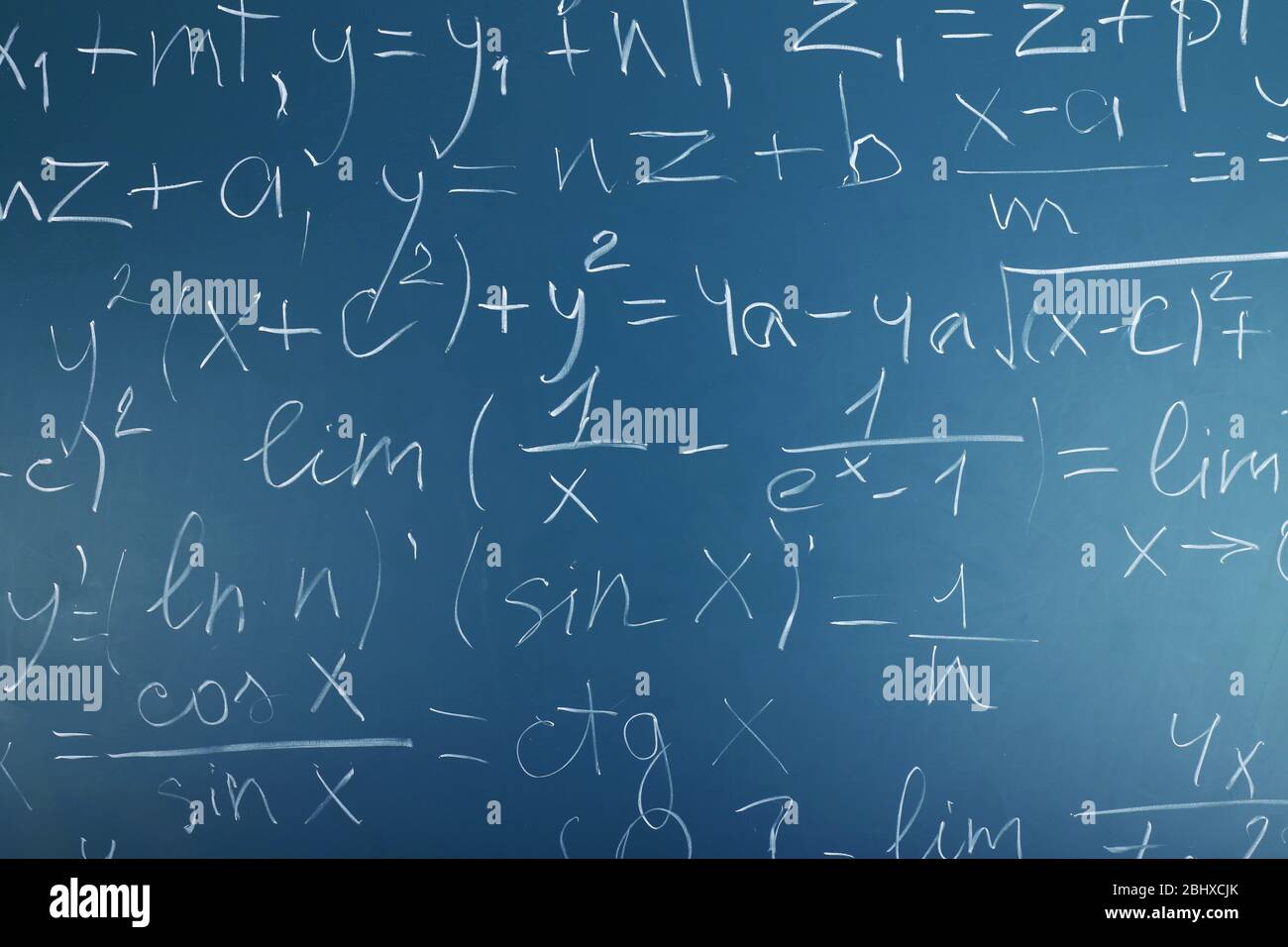 Maths formulas on chalkboard background Stock Photo - Alamy