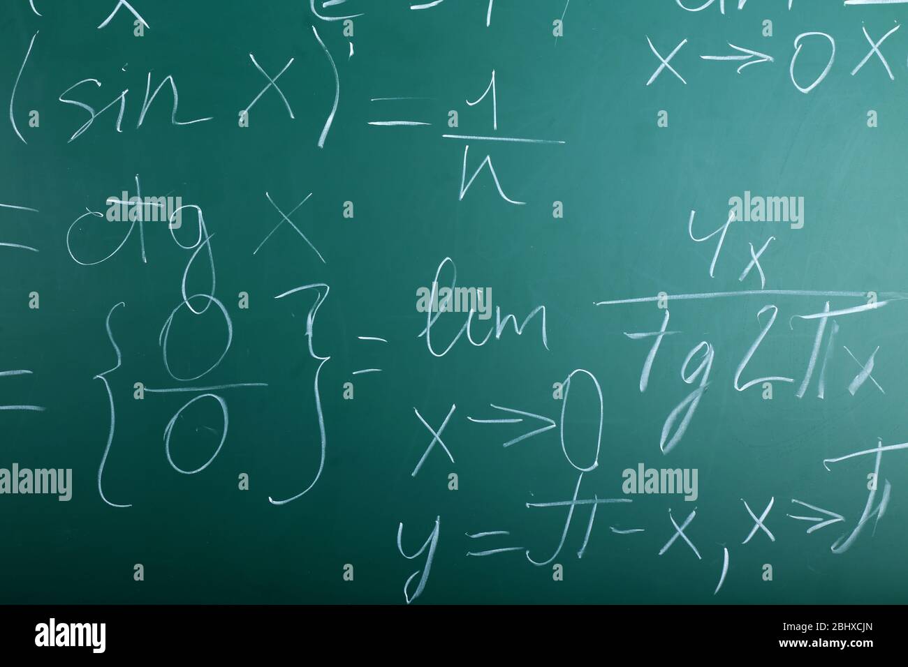 Maths formulas on chalkboard background Stock Photo - Alamy