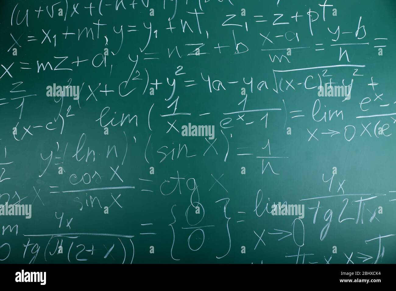 Maths formulas on chalkboard background Stock Photo - Alamy