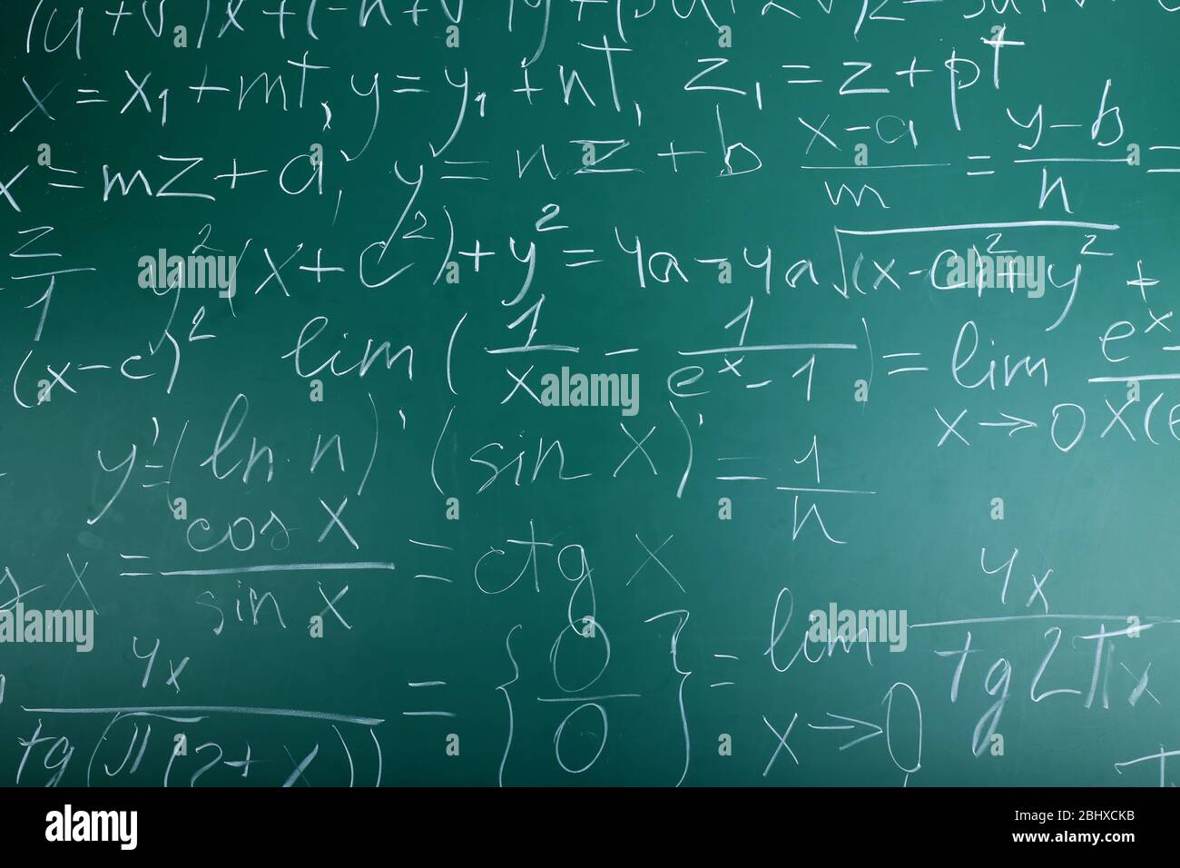 Maths formulas on chalkboard background Stock Photo - Alamy