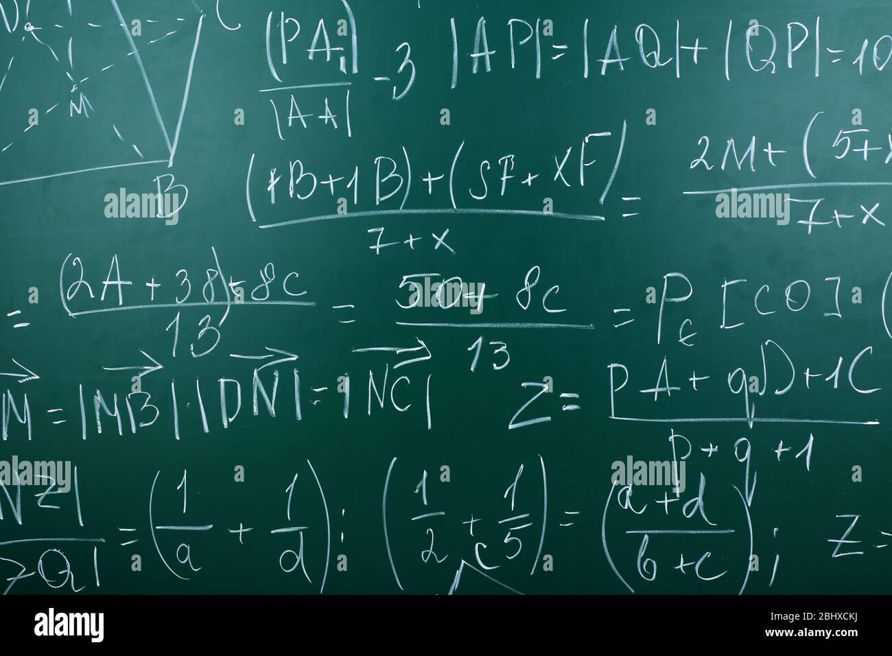 Maths formulas on chalkboard background Stock Photo - Alamy